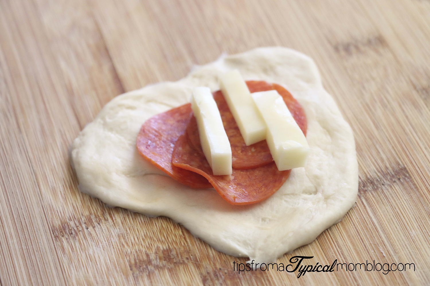Easy Stuffed Pizza Rolls Made with Rhodes Roll Dough - Tips from a ...